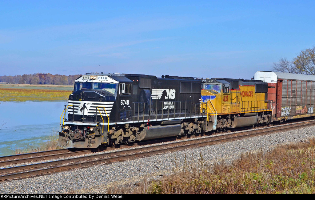 NS 6748, UP-4127. BNSF's Aurora Sub.